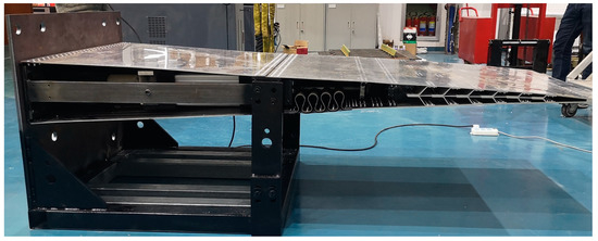 Design and Experiment of a Seamless Morphing Trailing Edge