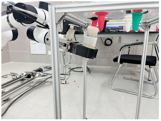 Design of a Teat Cup Attachment Robot for Automatic Milking Systems
