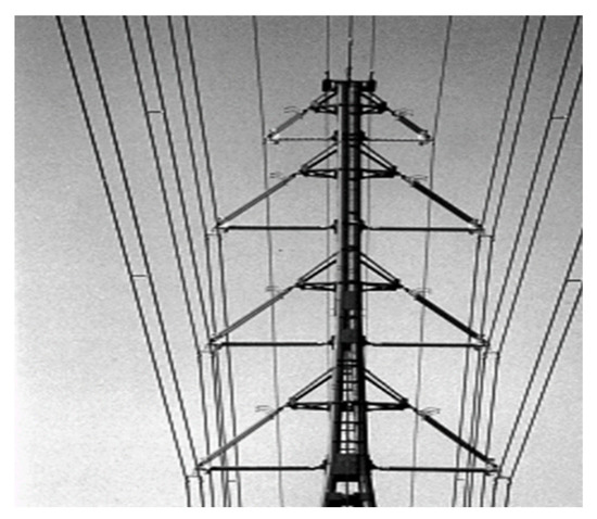 Historical Review of Advancements in Insulated Cross-Arm Technology