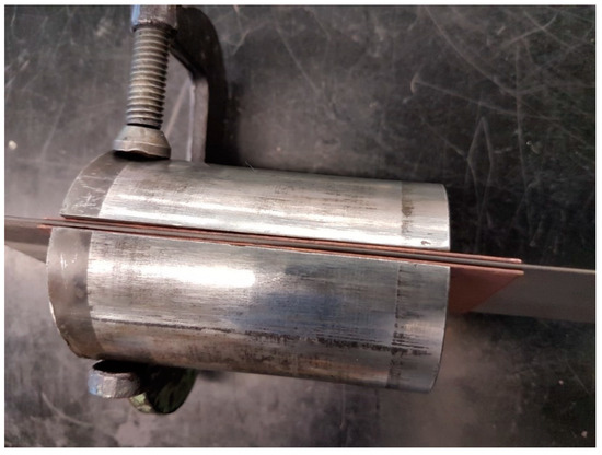 Innovative Wedge Anchorage for CFRP Plates: Development and Testing