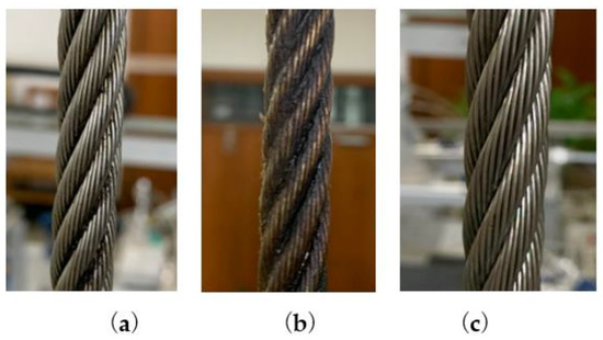 Design and Implementation of a Wire Rope Climbing Robot for Sluices