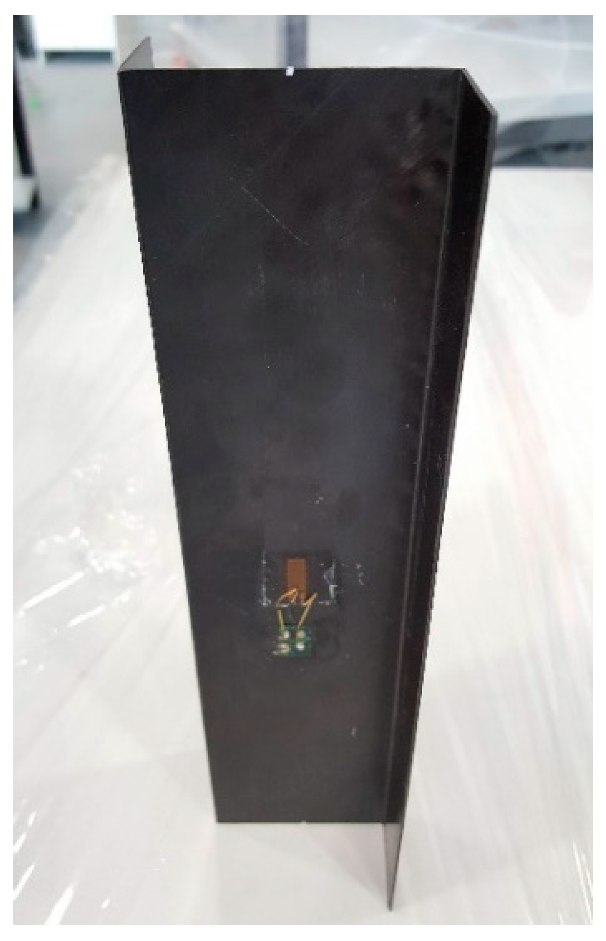 Load Eccentricity of Compressed Composite Z-Columns in Non-Linear State